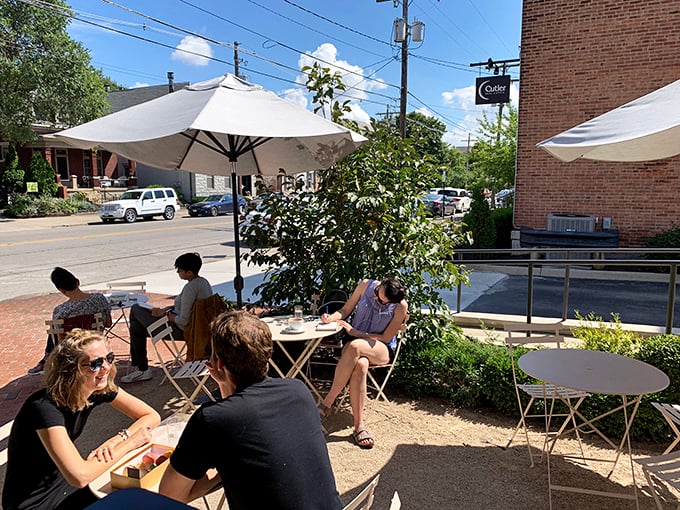 Outdoor seating where German Village charm meets French café culture – people-watching paradise with a pastry in hand.