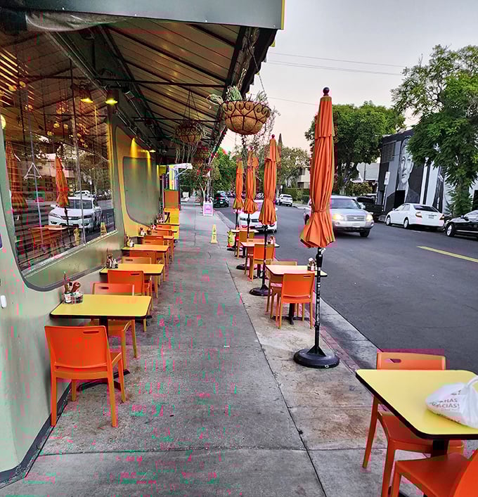 Sidewalk seating that captures the essence of Los Feliz living – casual, colorful, and perfectly positioned for people-watching between bites.