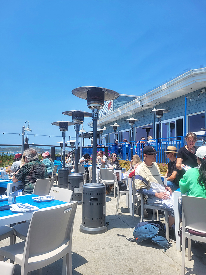 Outdoor dining with heat lamps and ocean views – because seafood always tastes better with a side of sea breeze.