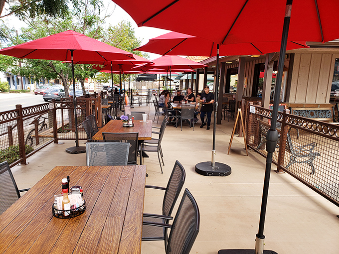 The outdoor seating area—where California sunshine meets Texas-style BBQ in a marriage made in culinary heaven.
