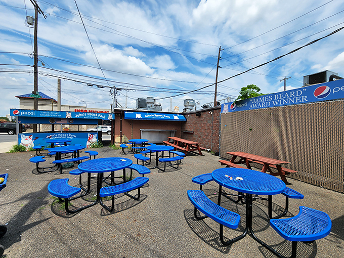 The outdoor seating area – where strangers become friends united by the universal language of "Oh my god, this sandwich is incredible."