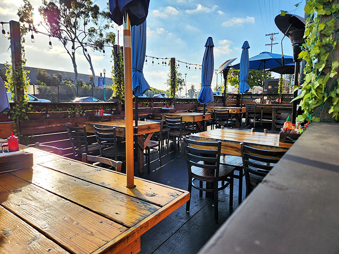 The outdoor patio—where ocean breezes, cold beers, and seafood dreams come together under the California sun.