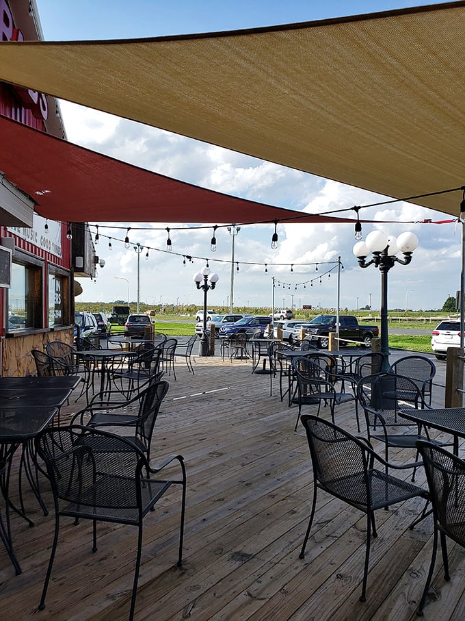 The outdoor seating area—where fresh air enhances fresh seafood. Those shade sails aren't just practical; they're setting the stage for memorable meals. 