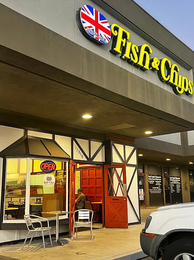 The Tudor-style exterior with its distinctive Union Jack sign stands as a beacon for those seeking authentic fish and chips.