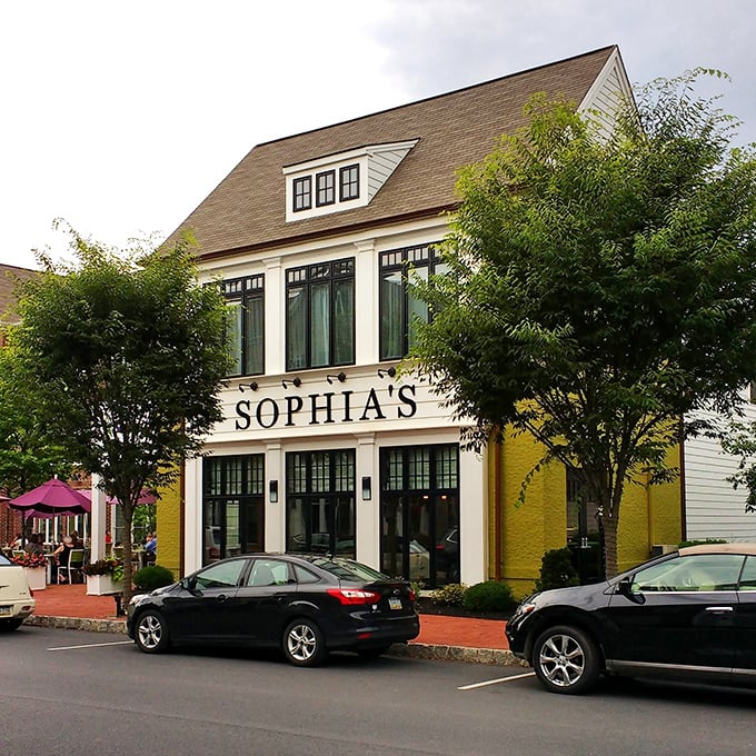 The distinctive white and yellow façade of Sophia's makes a statement on the street – "Yes, this is where the good food lives."