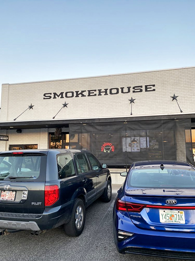 Cars in the parking lot tell the story – people drive from everywhere for this BBQ. The journey ends here, but the flavor memories last forever.