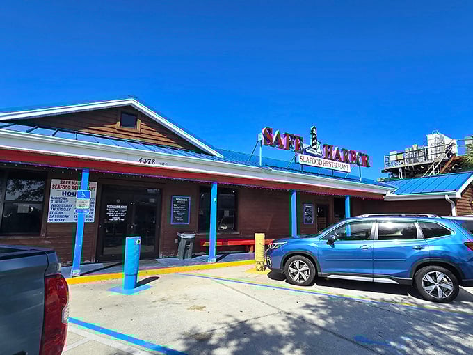 A parking lot filled with both luxury cars and pickup trucks – seafood: the great equalizer of Florida's social classes.