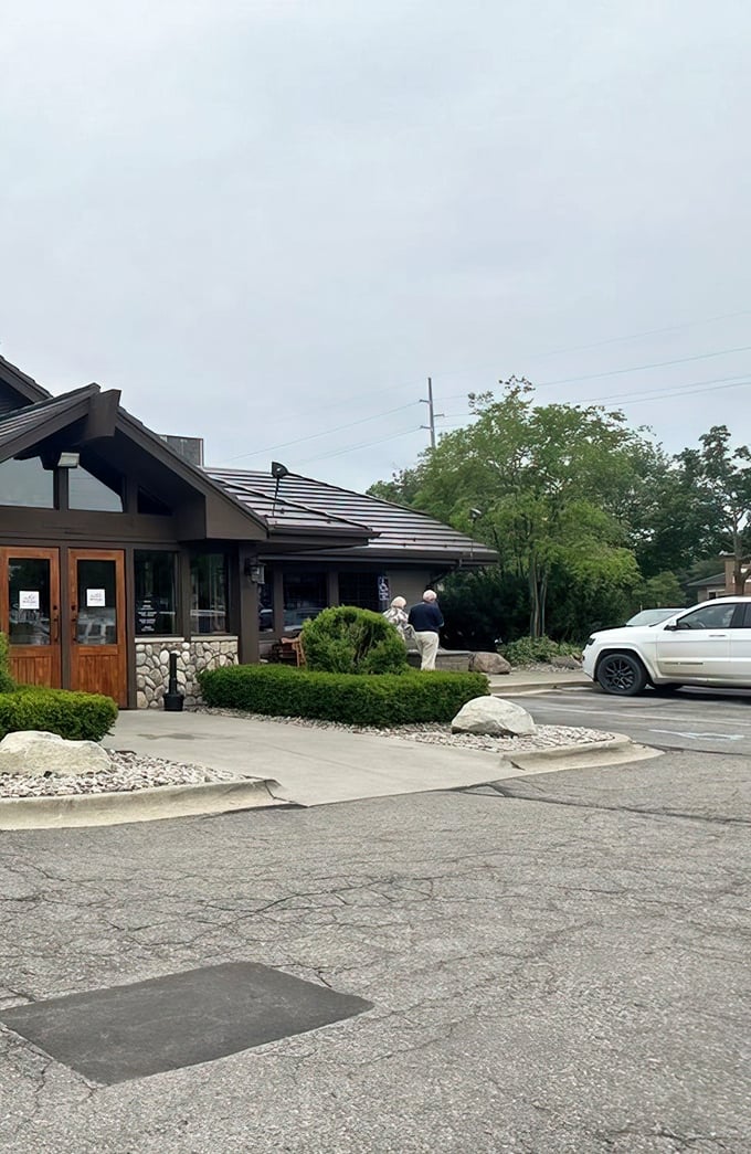 Landscaped with care and Michigan sensibility—no pretension, just a welcoming approach that says "come as you are, leave satisfied."