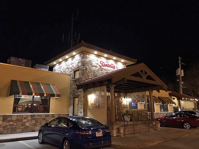 The parking lot at dusk isn't just full of cars—it's full of people making the best decision they'll make all day: eating at Stancato's.