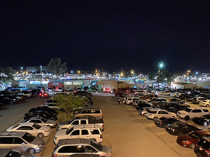 As night falls, the parking lot tells the story of Tanque Verde's popularity. Each car represents a family on a treasure hunt.