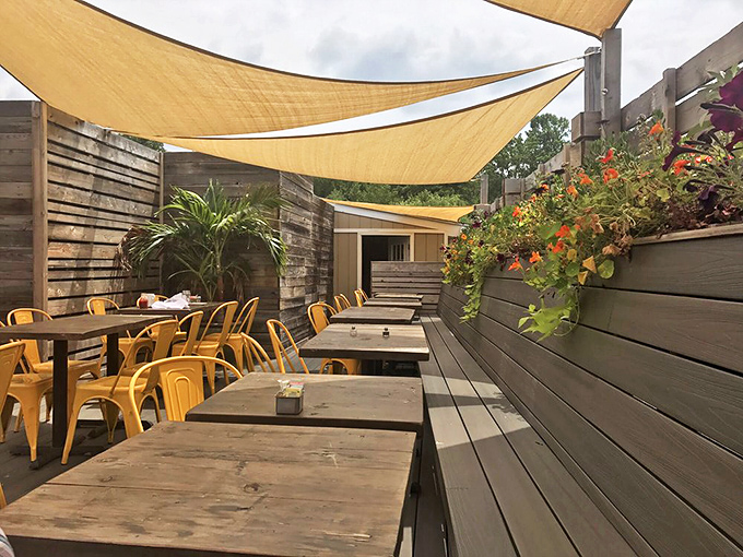 The secret garden of dining—where shade sails and planters create an outdoor oasis perfect for pancakes on pleasant Pennsylvania mornings.