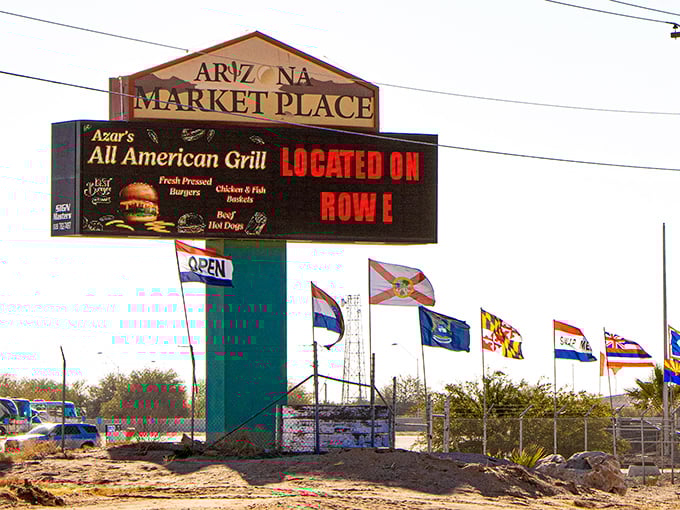 The marketplace sign stands as a beacon for bargain hunters and treasure seekers—complete with the promise of burgers when shopping fatigue sets in.