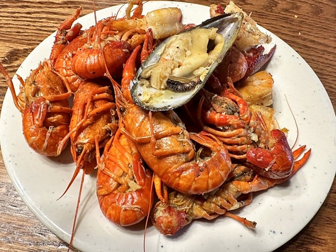 The seafood plate of champions—a mountain of crustacean glory that makes you wonder why you ever waste time on vegetables.