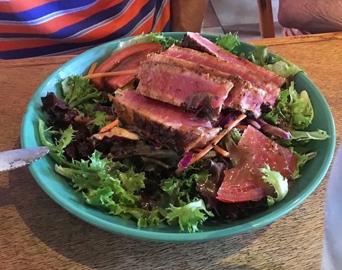 Seared tuna with the perfect pink center – rare as finding a parking spot at the beach on a holiday weekend. A salad that's definitely not settling.