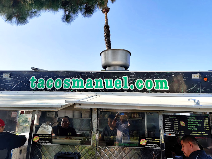Simple signage that lets the food do all the talking - no fancy marketing needed when quality speaks volumes.