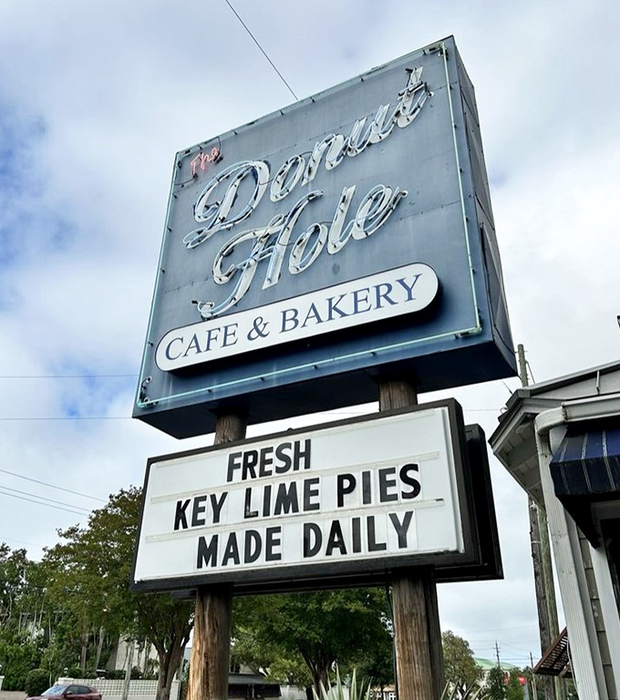 The sign that launched a thousand breakfast pilgrimages. Even under cloudy skies, it promises sunshine in pie form.