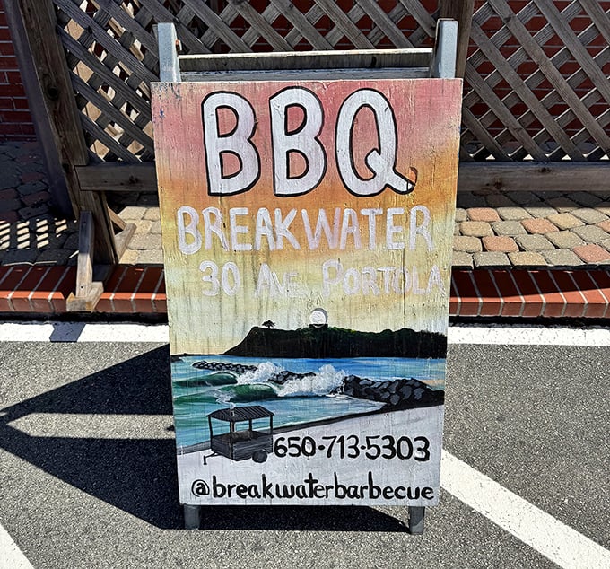 This sign doesn't just mark a location—it's a treasure map leading to some of California's most unexpected barbecue excellence.