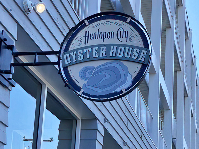 The sign that beckons seafood lovers like a lighthouse guides ships—a blue and white beacon of bivalve brilliance in Rehoboth Beach.