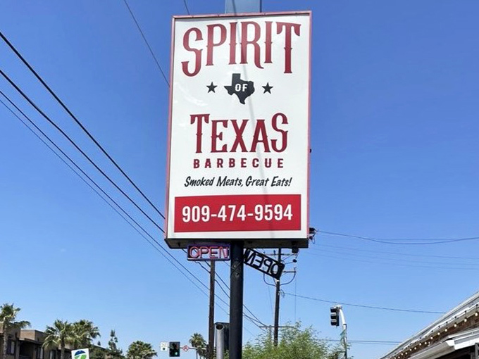 A beacon of hope for the barbecue faithful. This sign doesn't just mark a location—it promises a religious experience for your taste buds.
