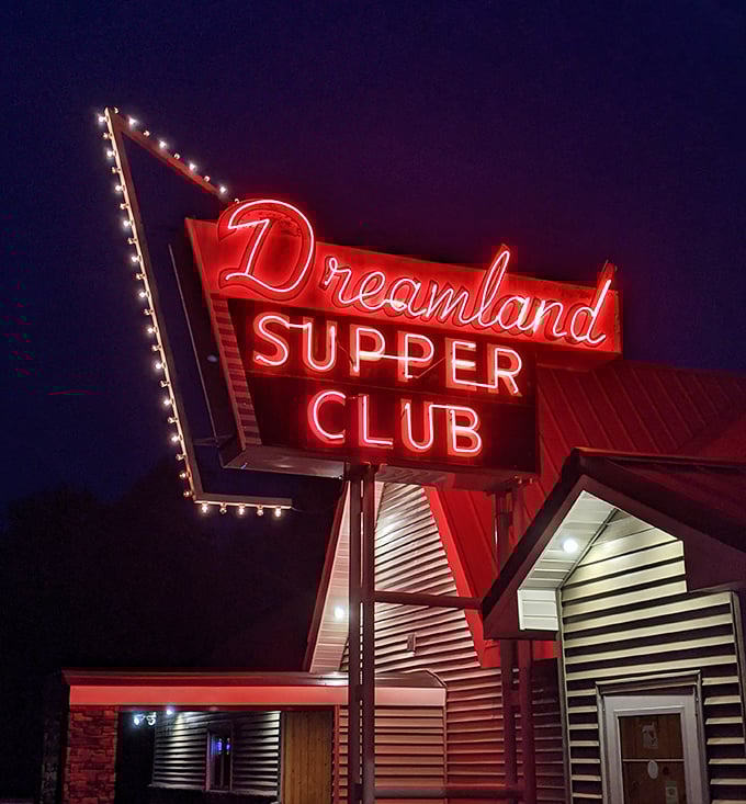 At night, the neon sign glows like a red-hot promise—"Yes, we're open, and yes, this will be worth the drive."