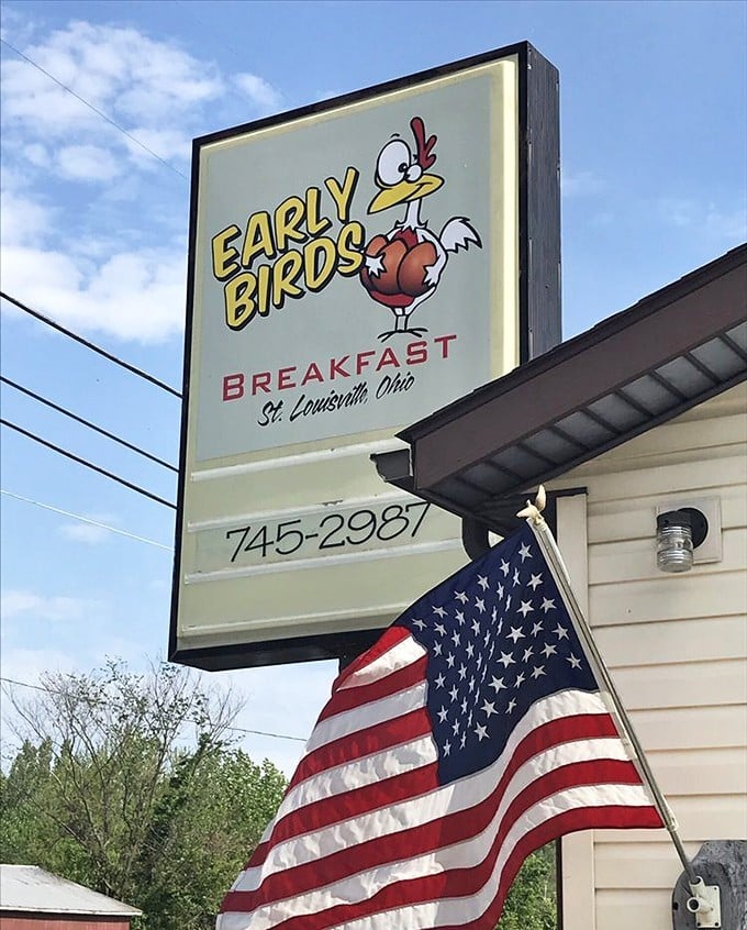 The iconic Early Birds sign and American flag—a perfect pairing that says "heartland breakfast" more eloquently than any food writer ever could.