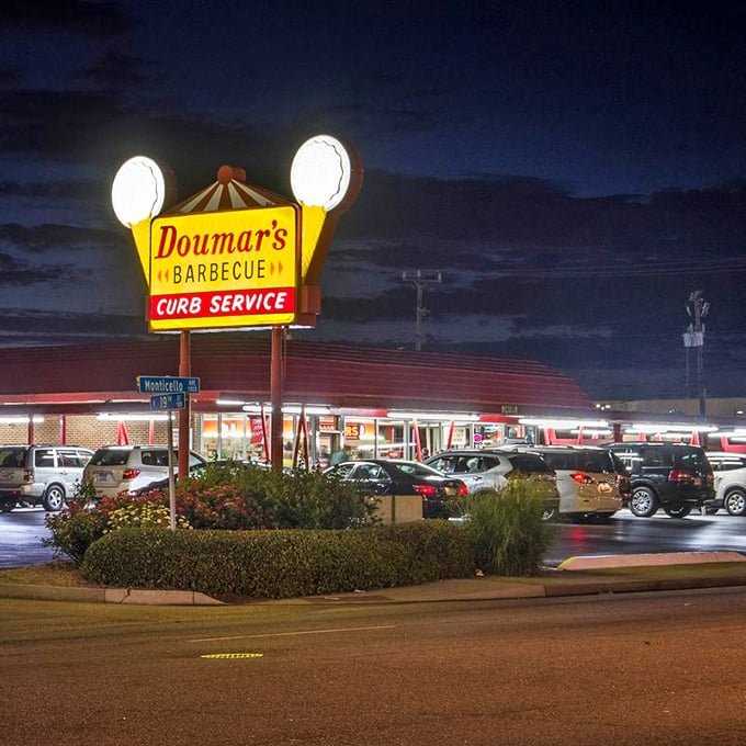 As darkness falls, that neon sign glows like a beacon of hope for hungry travelers. Some lights just guide you home.