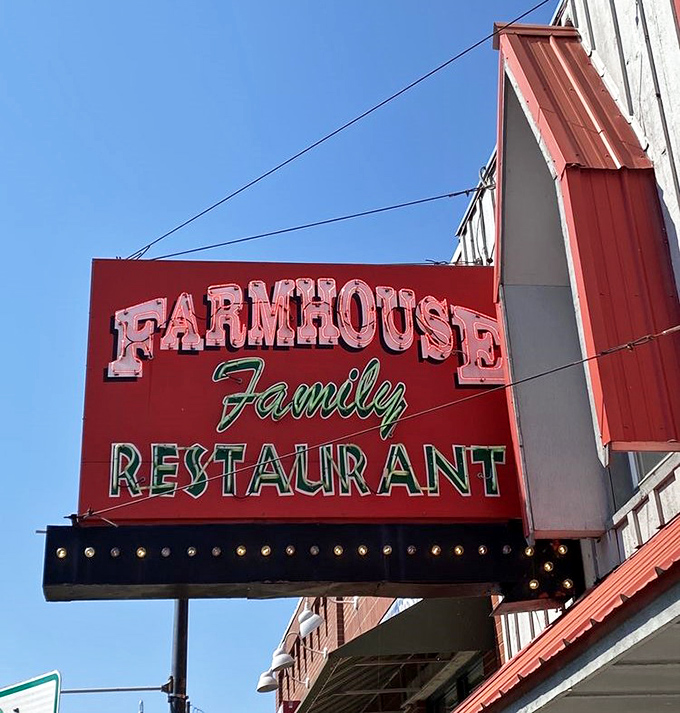 That classic neon sign against the Branson sky – a beacon of hope for hungry travelers seeking authenticity in a world of chain restaurants.