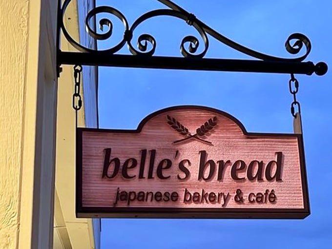 The wooden sign swings gently, like a portal between worlds. "Belle's Bread" isn't just a name—it's a promise of Japanese baking excellence in Columbus.