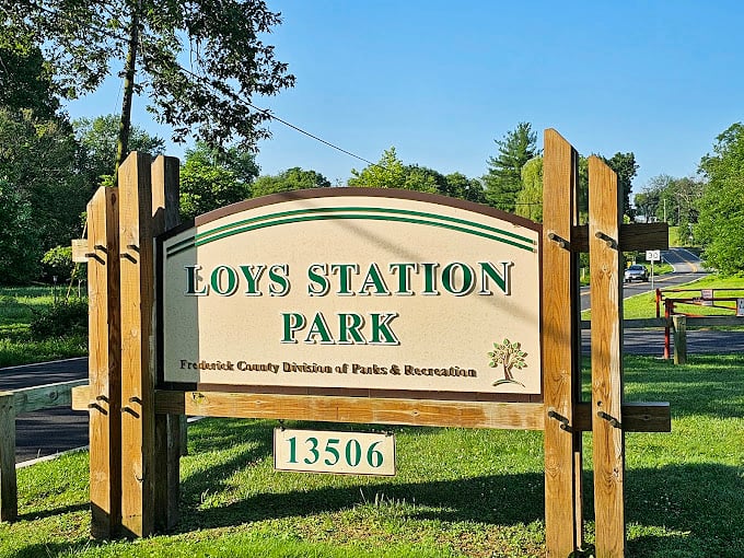 The sign promises adventure beyond – Loys Station Park delivers both recreation and a journey through Maryland's transportation history.