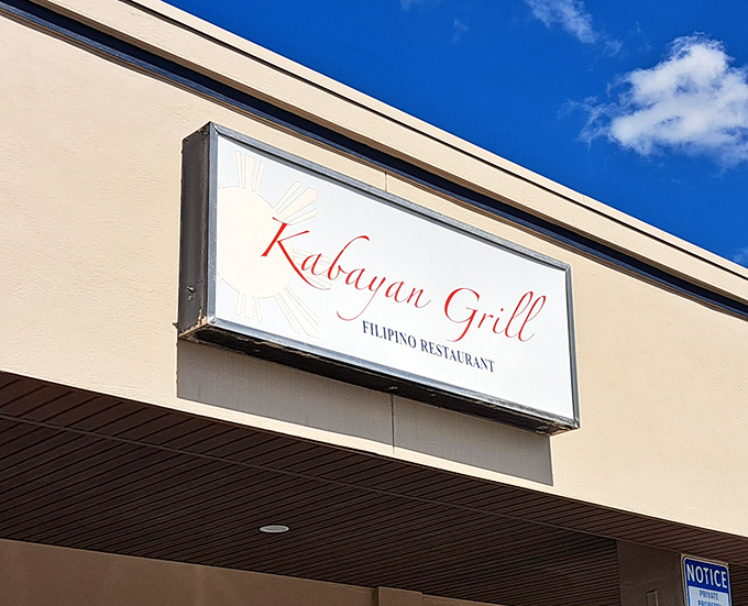 The sign that beckons like a lighthouse to hungry souls navigating the strip mall seas of Central Florida.