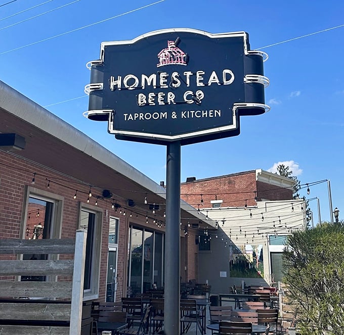 The sign that signals salvation for the hungry traveler – like a lighthouse for those lost in a sea of mediocre dining options.