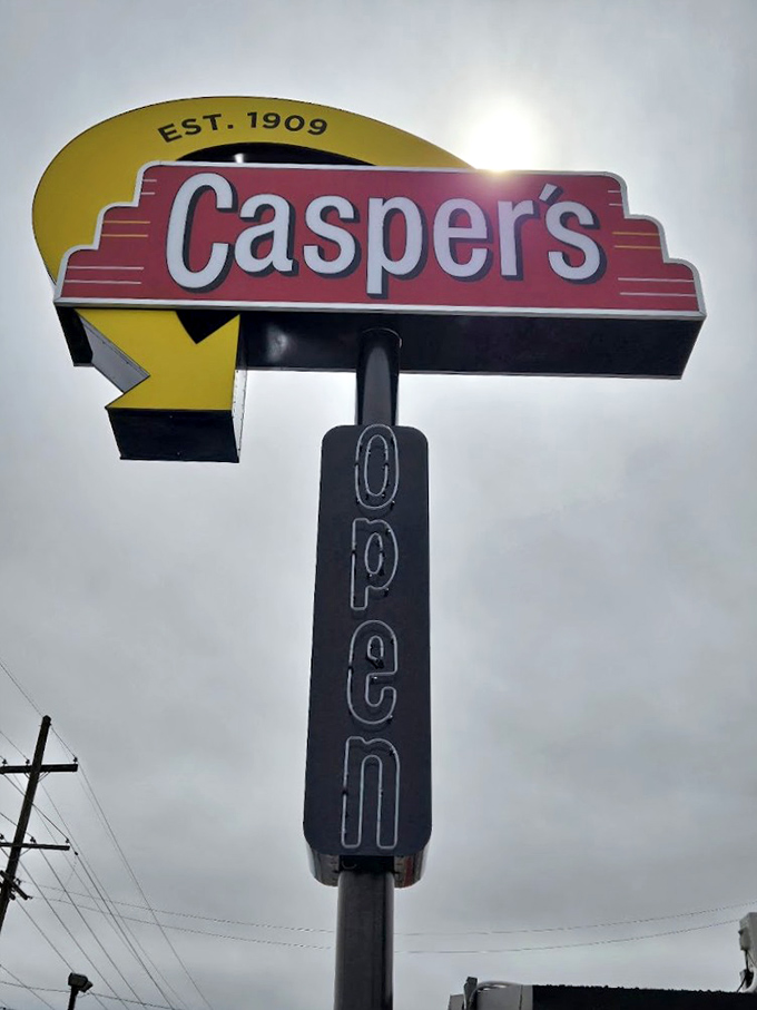 The vintage sign points the way to burger paradise, standing tall against the Missouri sky like a beacon for hungry travelers.