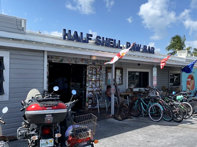 The entrance that promises seafood salvation just steps away. Those bicycles parked outside suggest the smartest way to arrive after indulging.