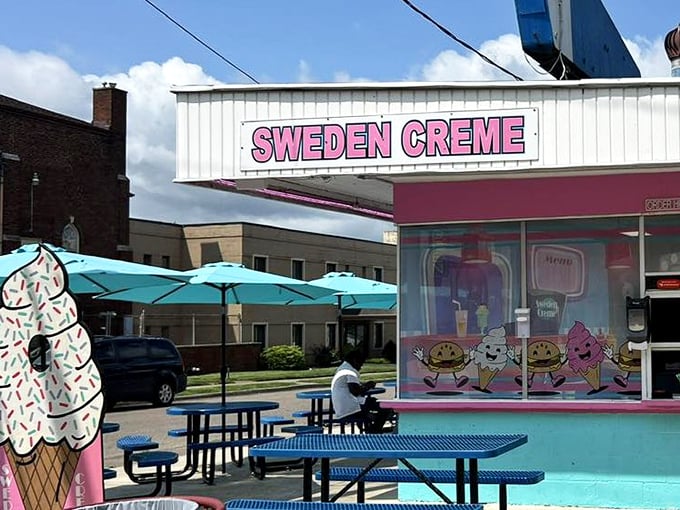 The classic roadside profile – where turquoise tables and cartoon ice cream cones promise a respite from the ordinary and a taste of nostalgia.