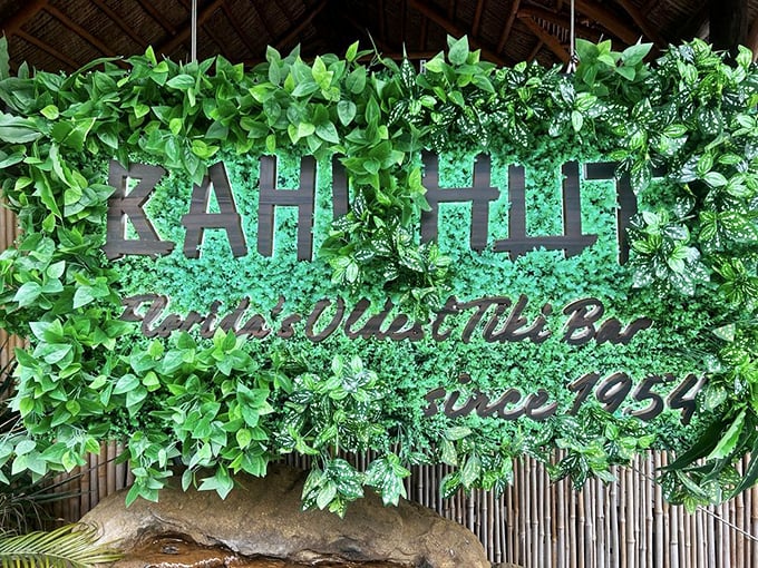 Lush greenery and thoughtful signage welcome guests to this hidden Polynesian paradise in downtown Sarasota.