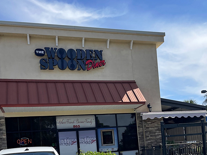 The sign that's guided countless hungry souls to breakfast bliss—standing proud against the Florida sky like a beacon of pancake possibility.