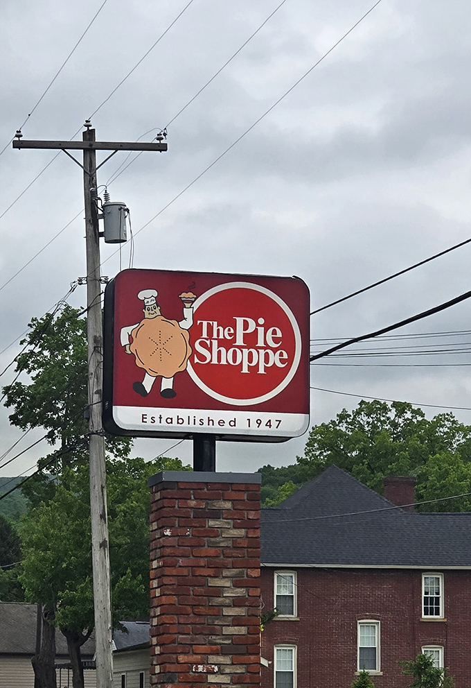 That iconic sign has been guiding hungry travelers since 1947—the pie mascot practically winking as if to say, "Yes, it's worth the detour."