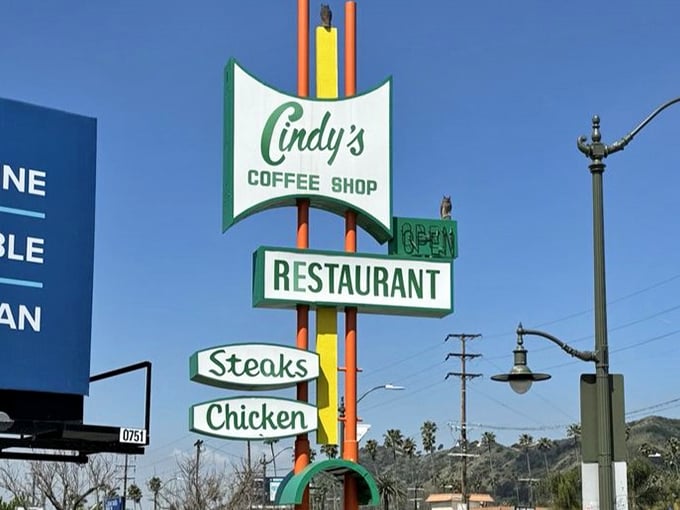 This isn't just signage; it's a beacon of hope for travelers who've endured one too many disappointing drive-thru experiences in search of authentic flavor.