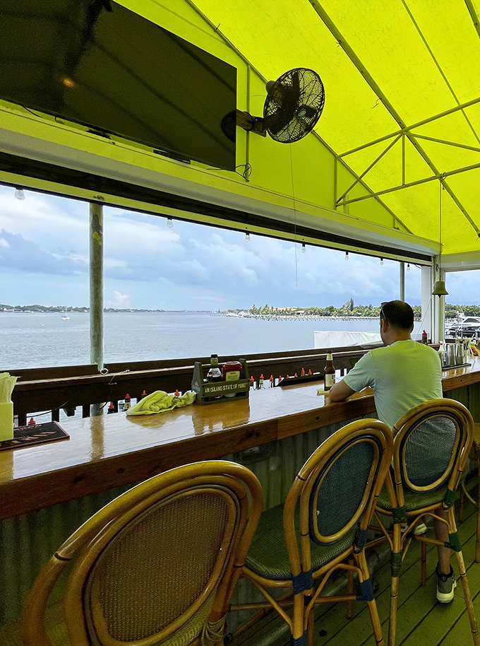 The upper deck offers front-row seats to nature's daily show of boats, birds, and breathtaking skies.