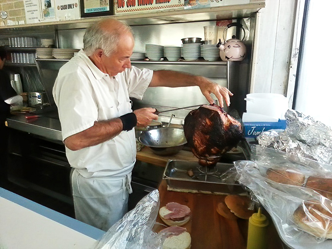 The art of ham carving requires precision and respect for the meat. Each slice must be thin enough to melt on your tongue but substantial enough to satisfy.
