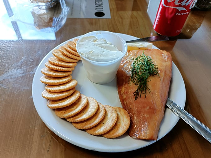 Simple presentation, extraordinary flavor—crackers standing by to escort smoked salmon to your taste buds with minimal interference.