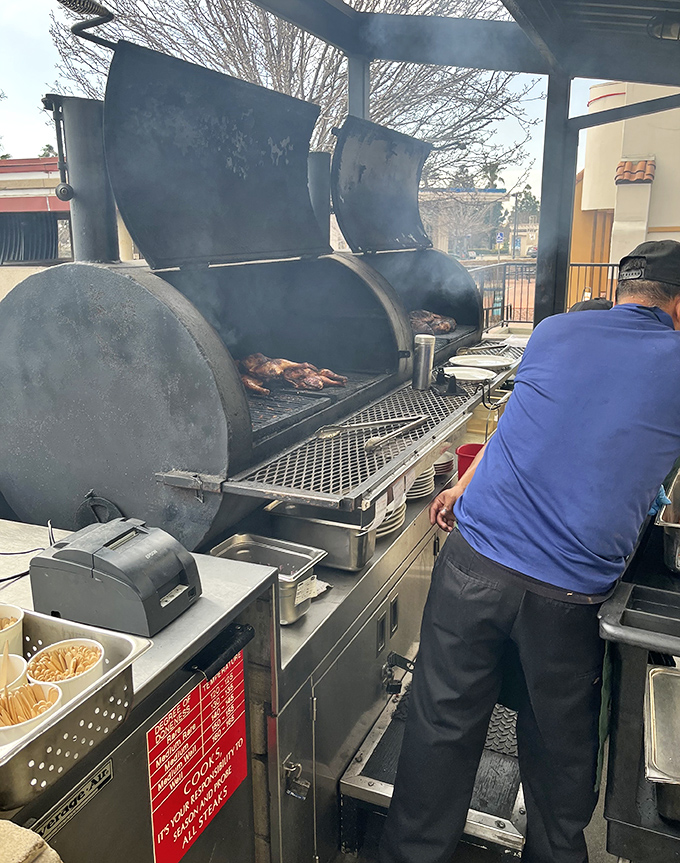 That smoker isn't just cooking meat—it's performing time-honored alchemy, transforming simple ingredients into something that makes you close your eyes when you taste it.