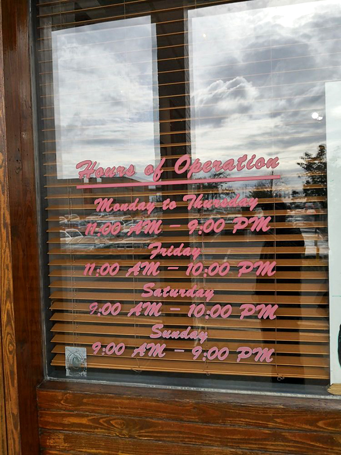 Hours of operation displayed like a promise—a covenant between restaurant and hungry patron that says, "We'll be here when you need us most."