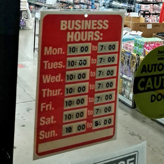 The store hours sign—a beacon of hope for bargain hunters planning their strategic shopping missions. Early birds catch the best worms (and lamps, and cookware, and...).