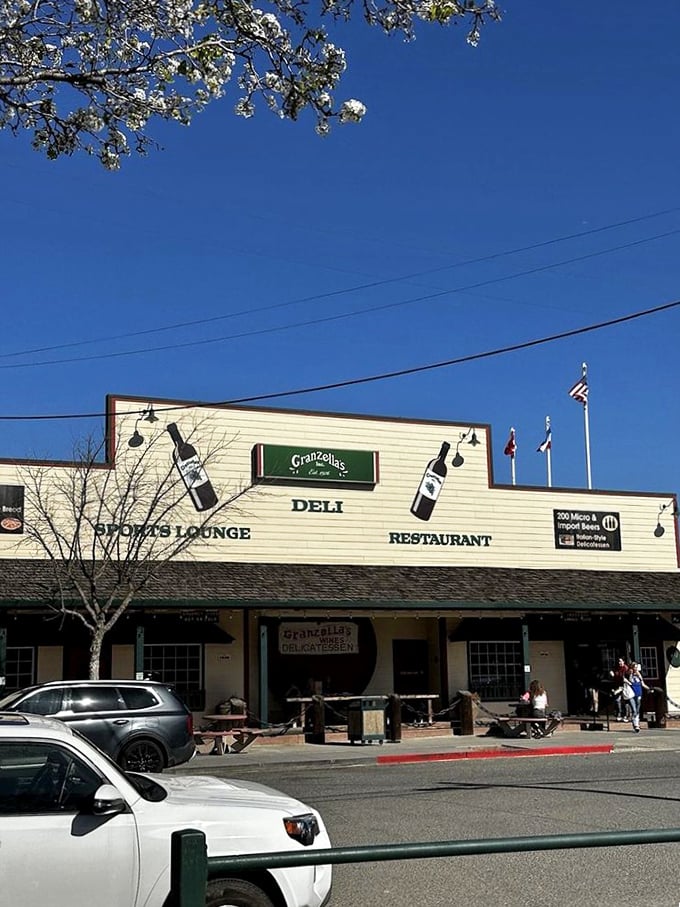 The iconic storefront against a blue California sky – a beacon of hope for hungry travelers since before GPS could find it.
