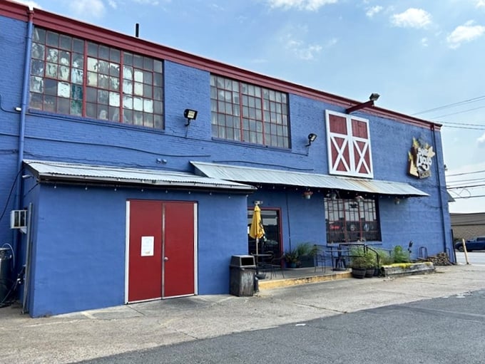 The blue exterior with red trim stands like a beacon of BBQ hope in an industrial area – worth the journey every single time.