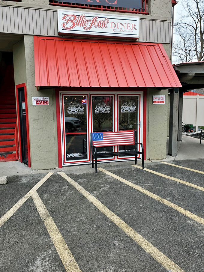 The iconic storefront with its patriotic bench—where many a food pilgrim has paused to mentally prepare for the delicious experience that awaits inside.