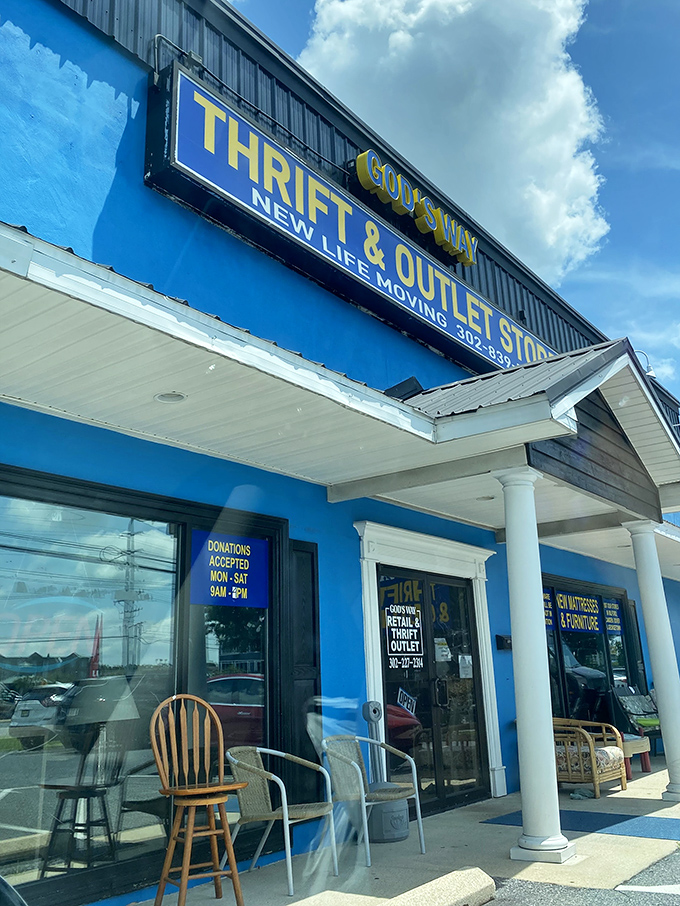Sidewalk seating welcomes weary shoppers. The bright blue exterior practically shouts "Bargains inside!" to passing traffic.
