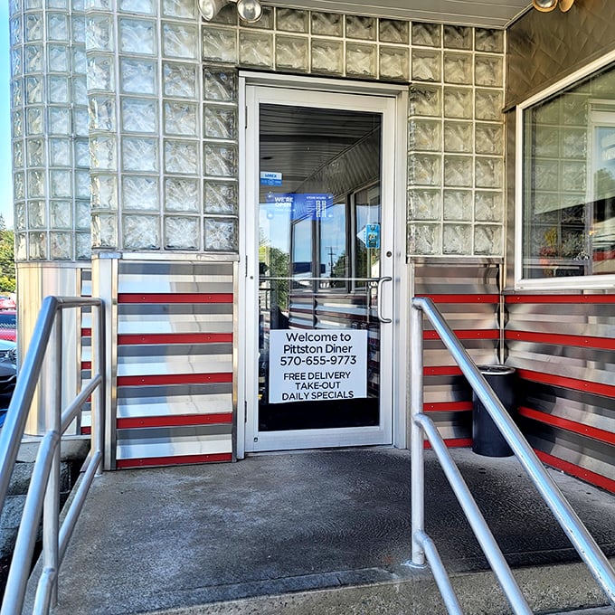 The entrance to breakfast paradise—where glass blocks and red stripes promise that inside, calories don't count and coffee refills are endless.