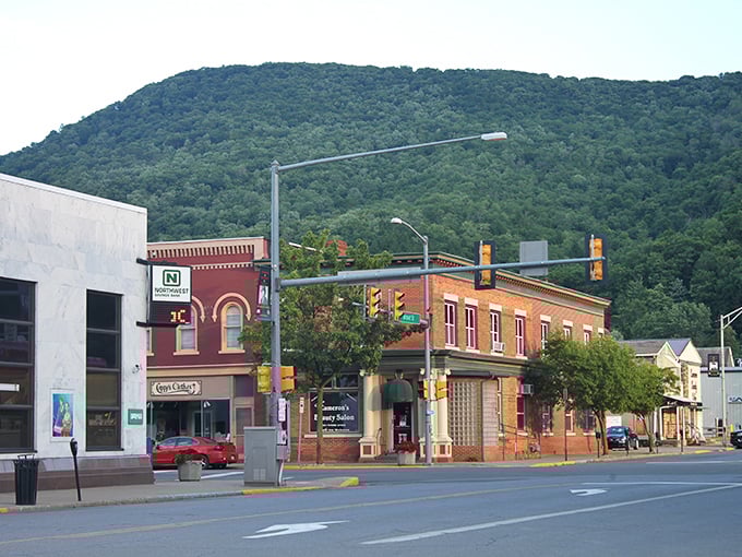 Main Street intersections offer glimpses of mountains at every turn, reminding residents that nature's majesty is just part of the daily commute here.